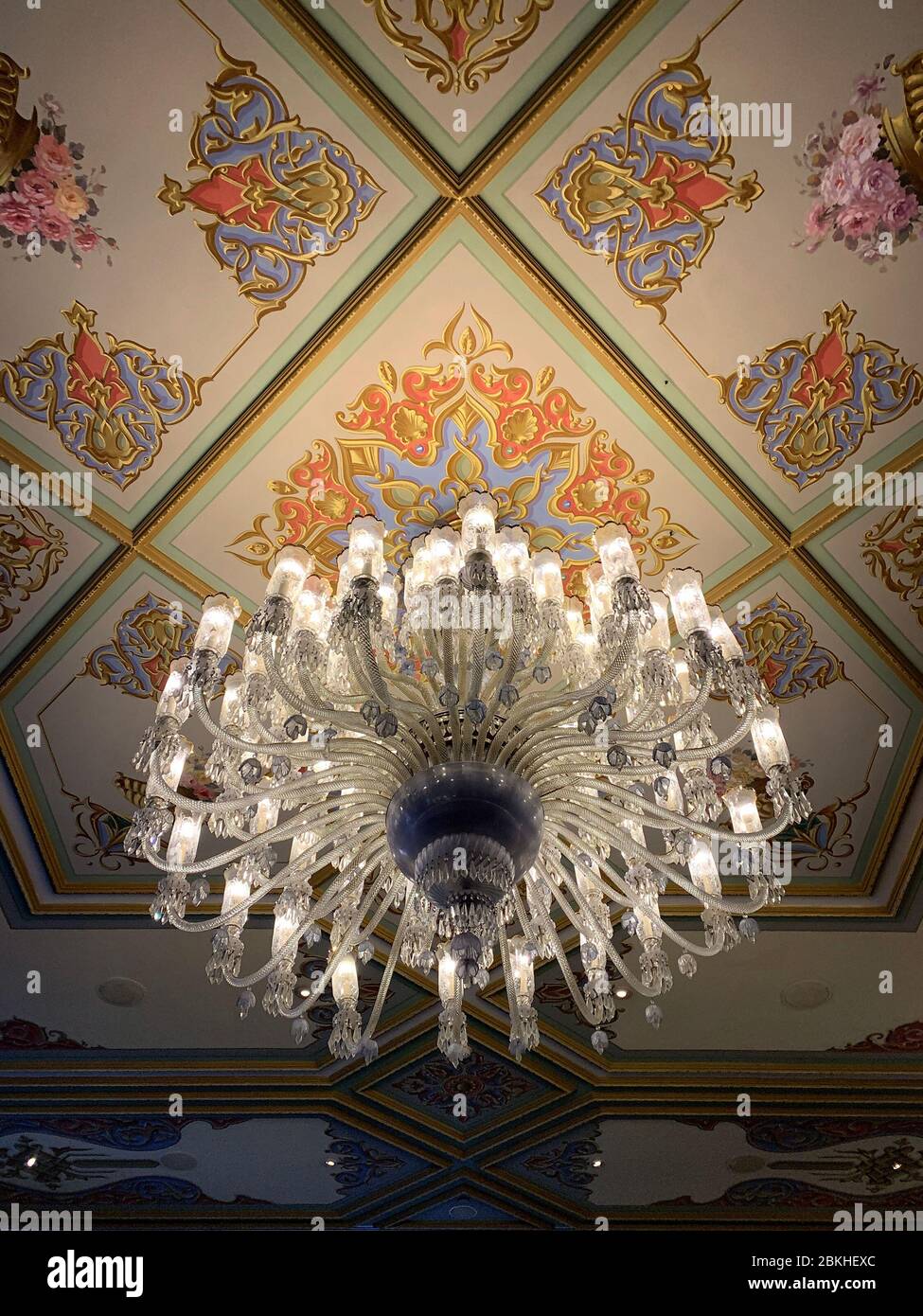 View of historical, old, classical chandelier and ornamental ceiling ...