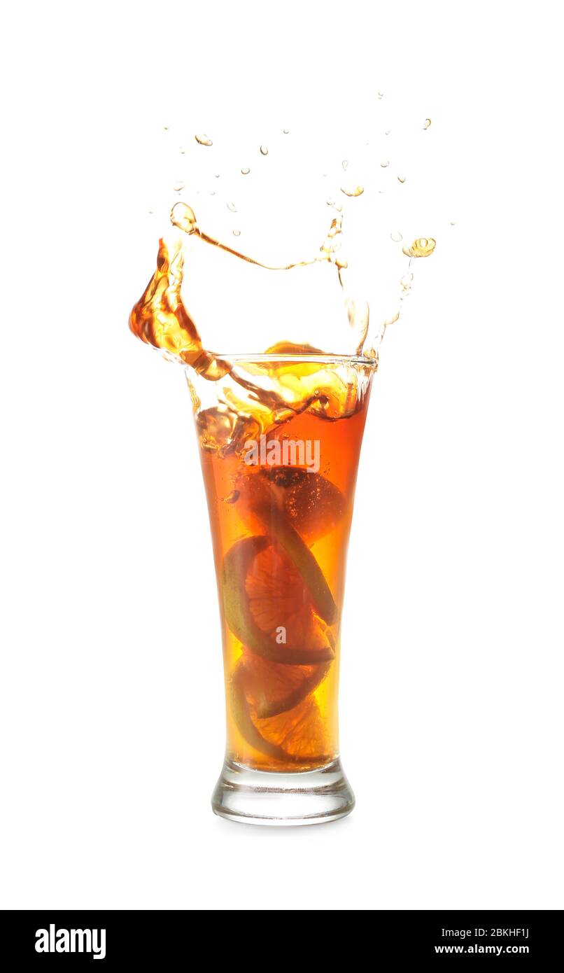 Glass of tasty cold ice tea with splash on white background Stock Photo ...