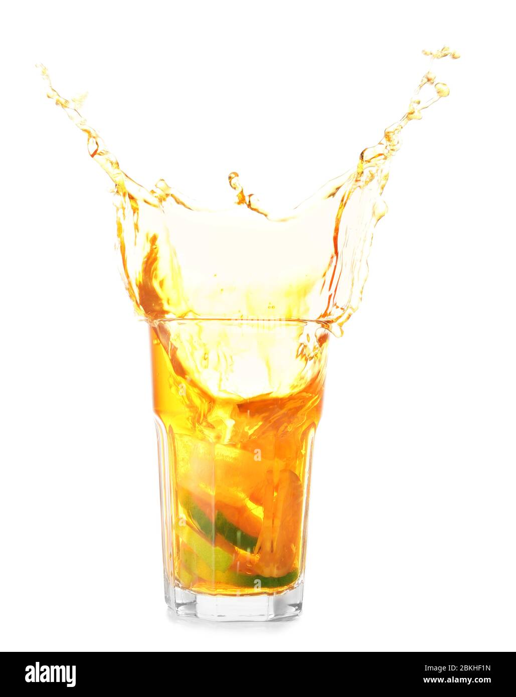 Glass of tasty cold ice tea with splash on white background Stock Photo ...