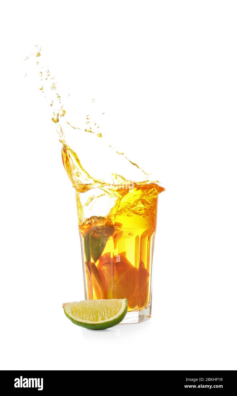 Glass of tasty cold ice tea with splash on white background Stock Photo ...