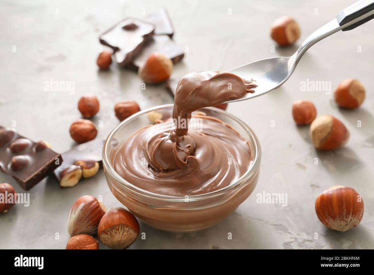 Spoon chocolate paste nuts hi-res stock photography and images - Alamy
