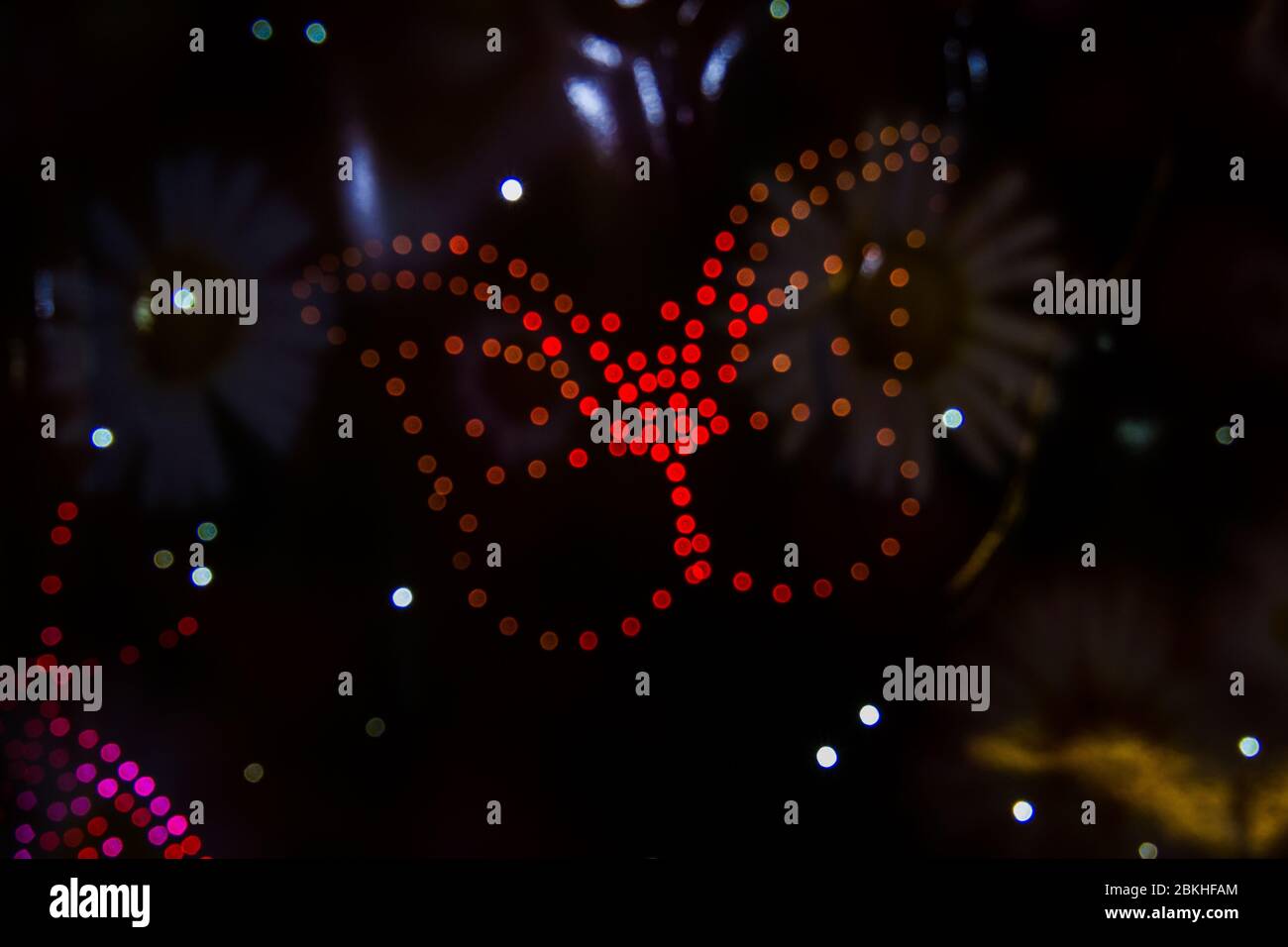 A butterfly formed by LED lights and the Bokeh effect in various colors ...