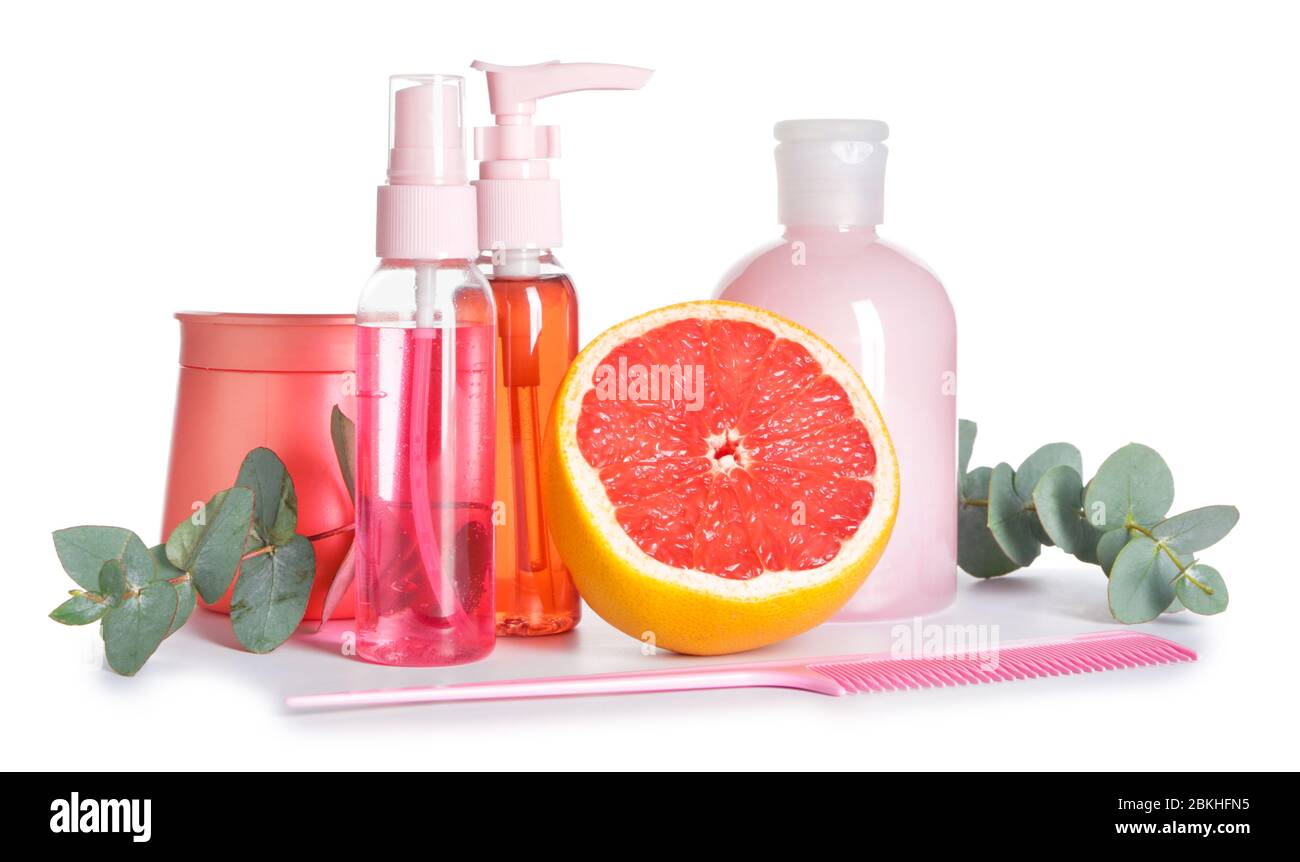 Cosmetics for hair on white background Stock Photo - Alamy