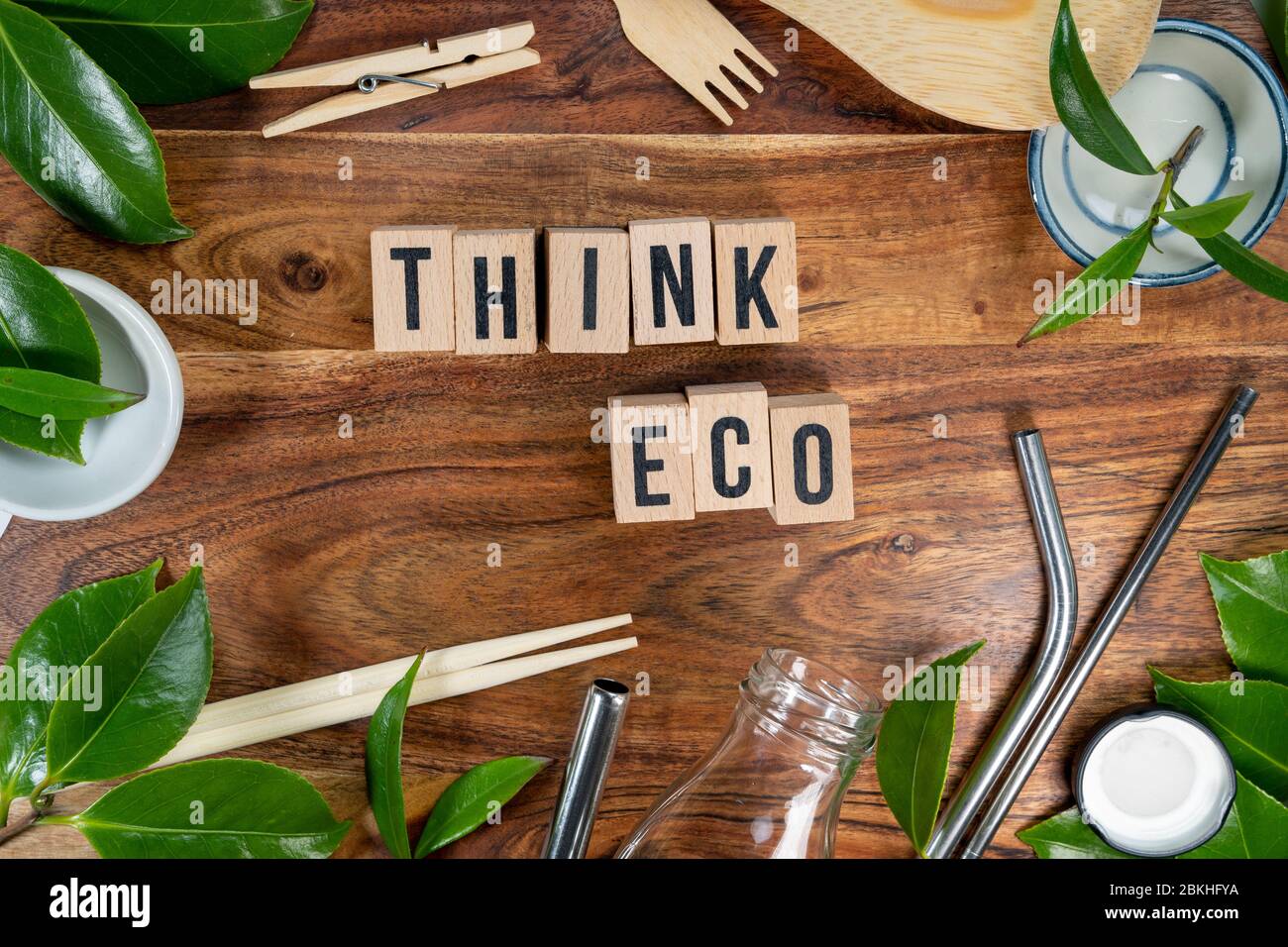 The wooden brick with words " THINK ECO " on wooden background. ECO ...