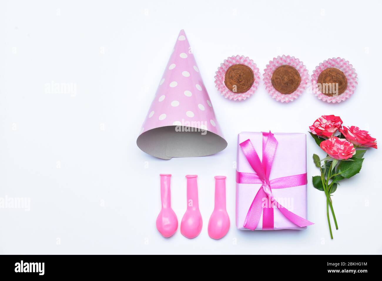 Birthday composition on white background Stock Photo - Alamy