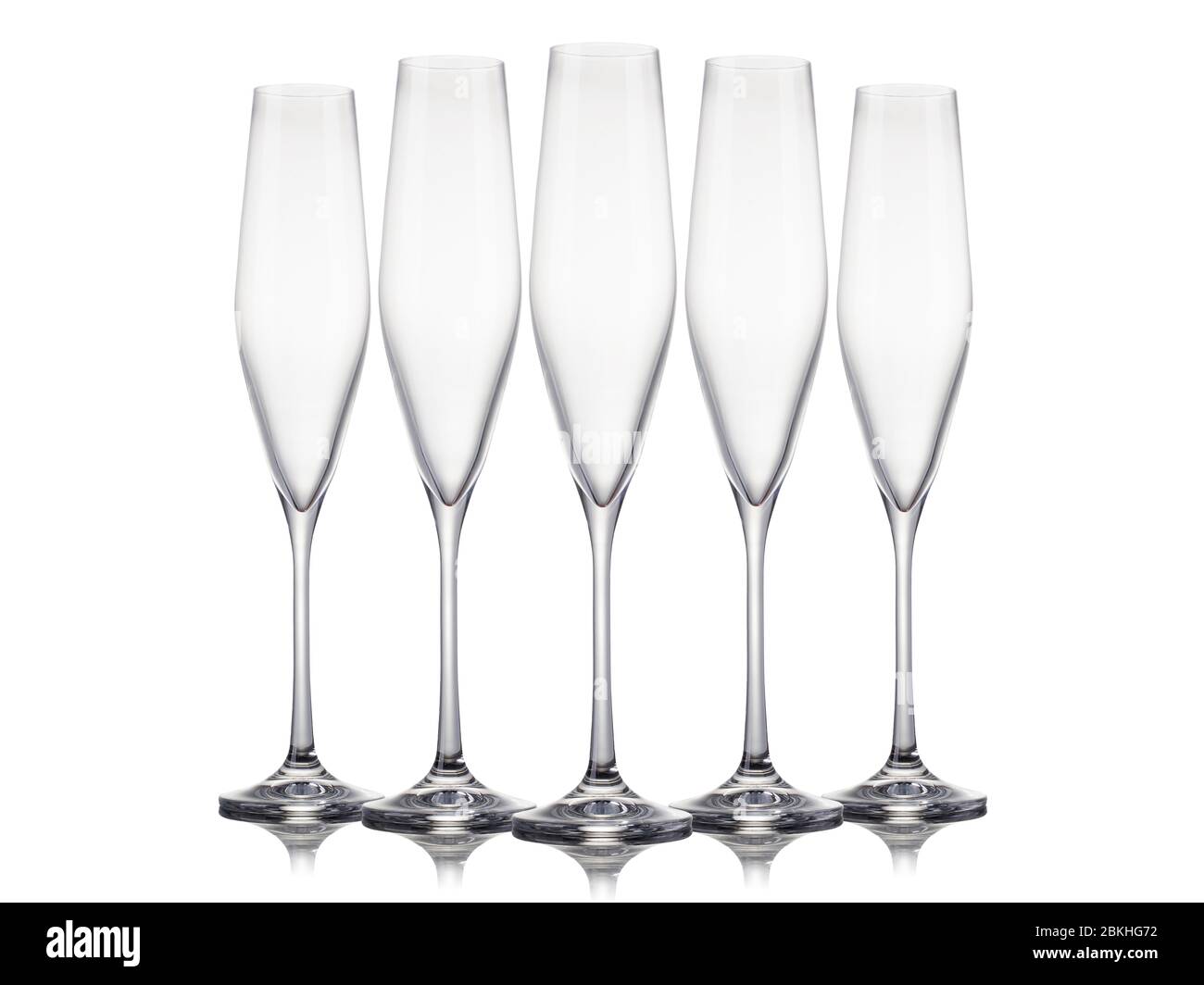 Set of empty champagne glasses in a row isolated on a white background ...