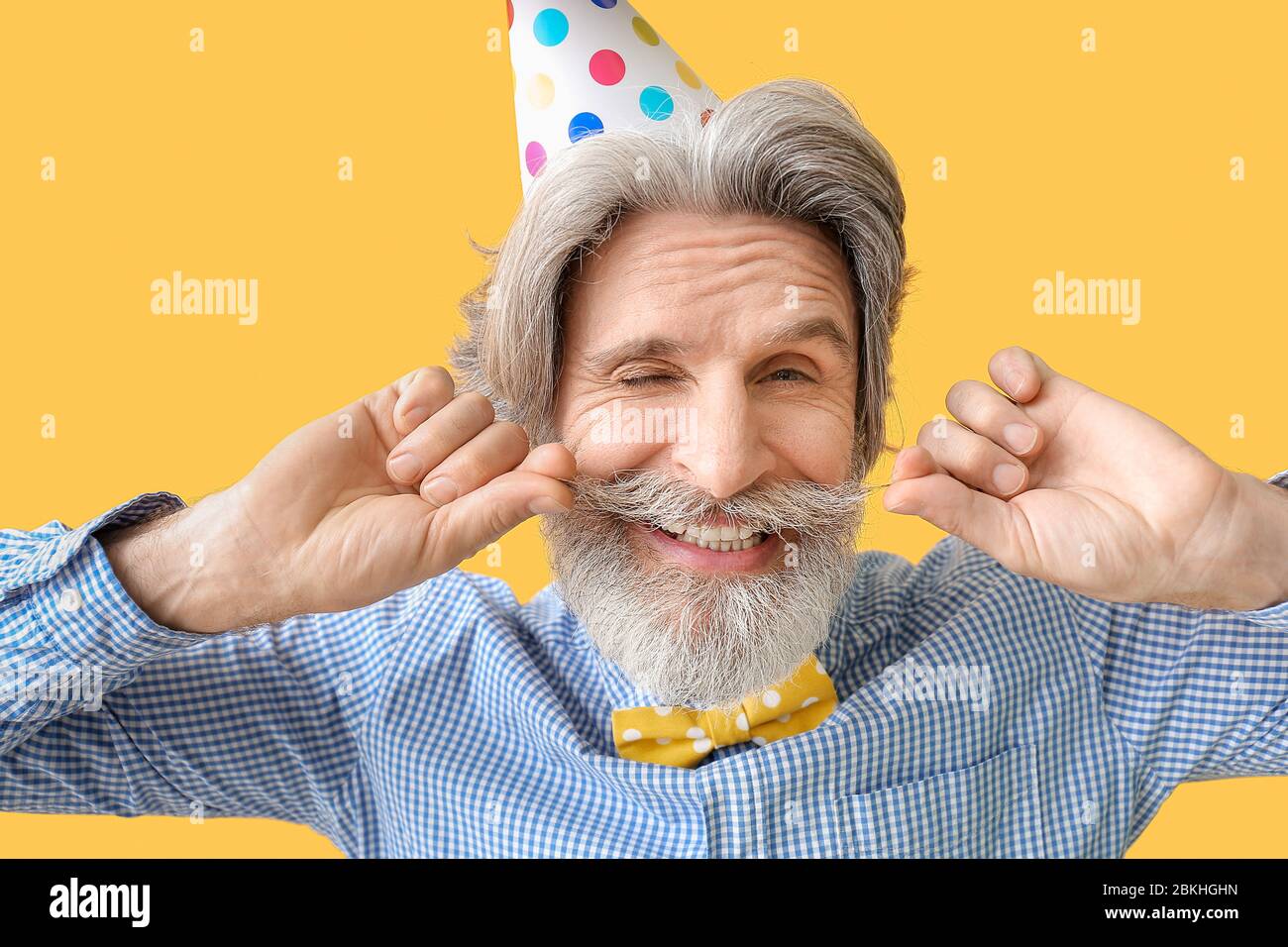 Senior man celebrating birthday hi-res stock photography and images - Alamy