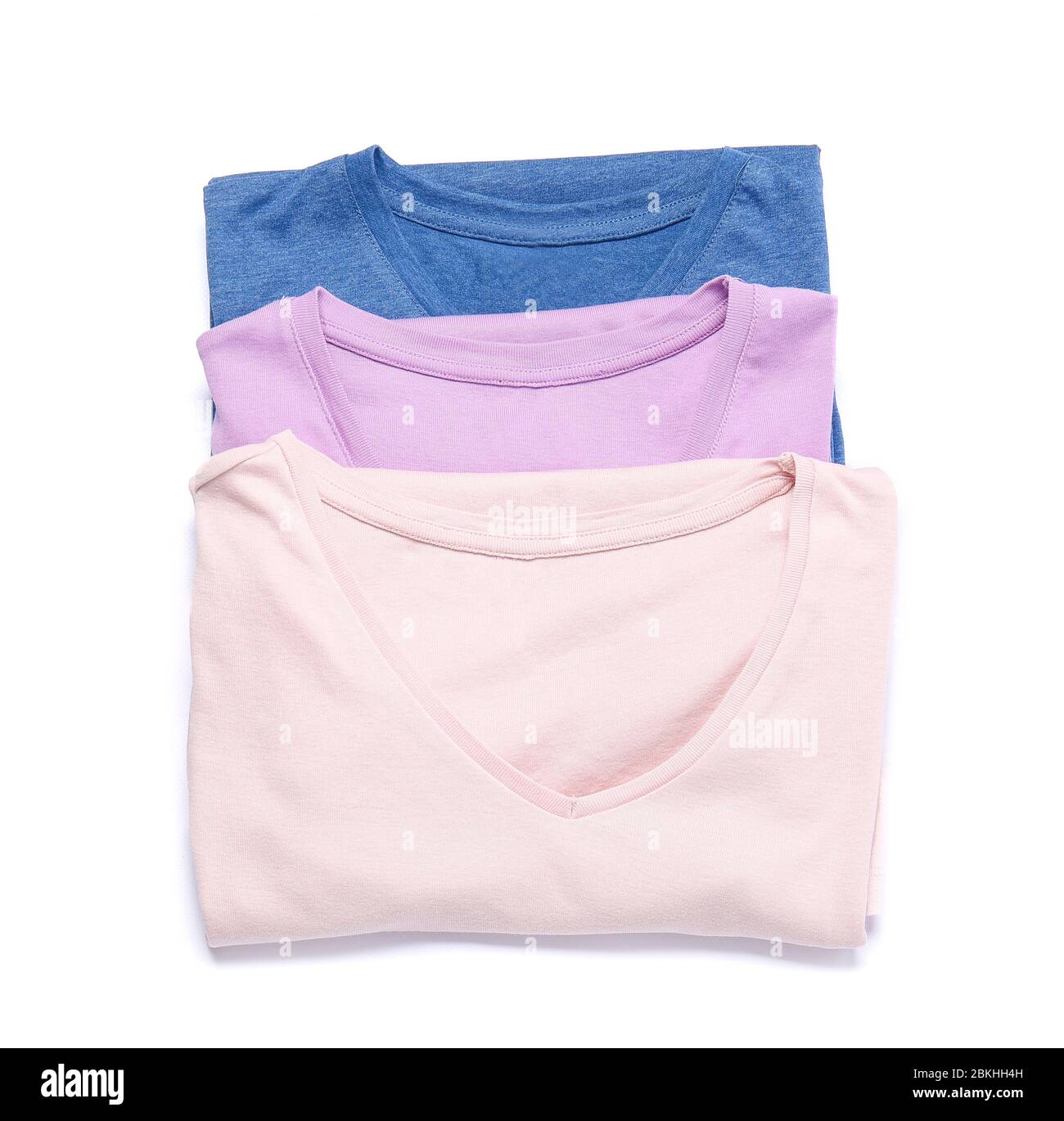 Stylish t-shirts on white background Stock Photo - Alamy