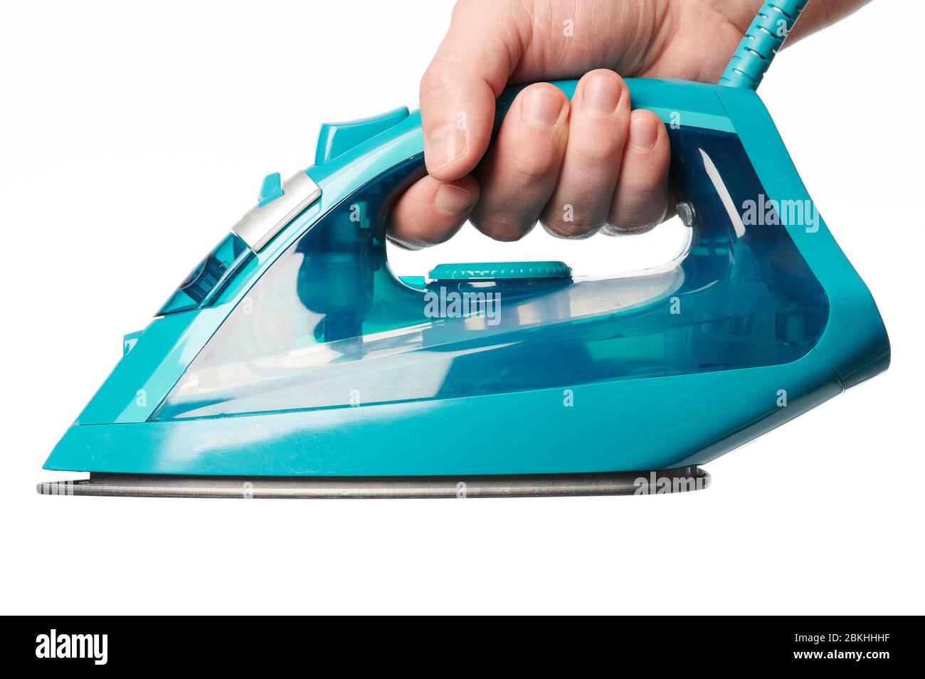 Iron in man hand isolated on white studio background Stock Photo - Alamy