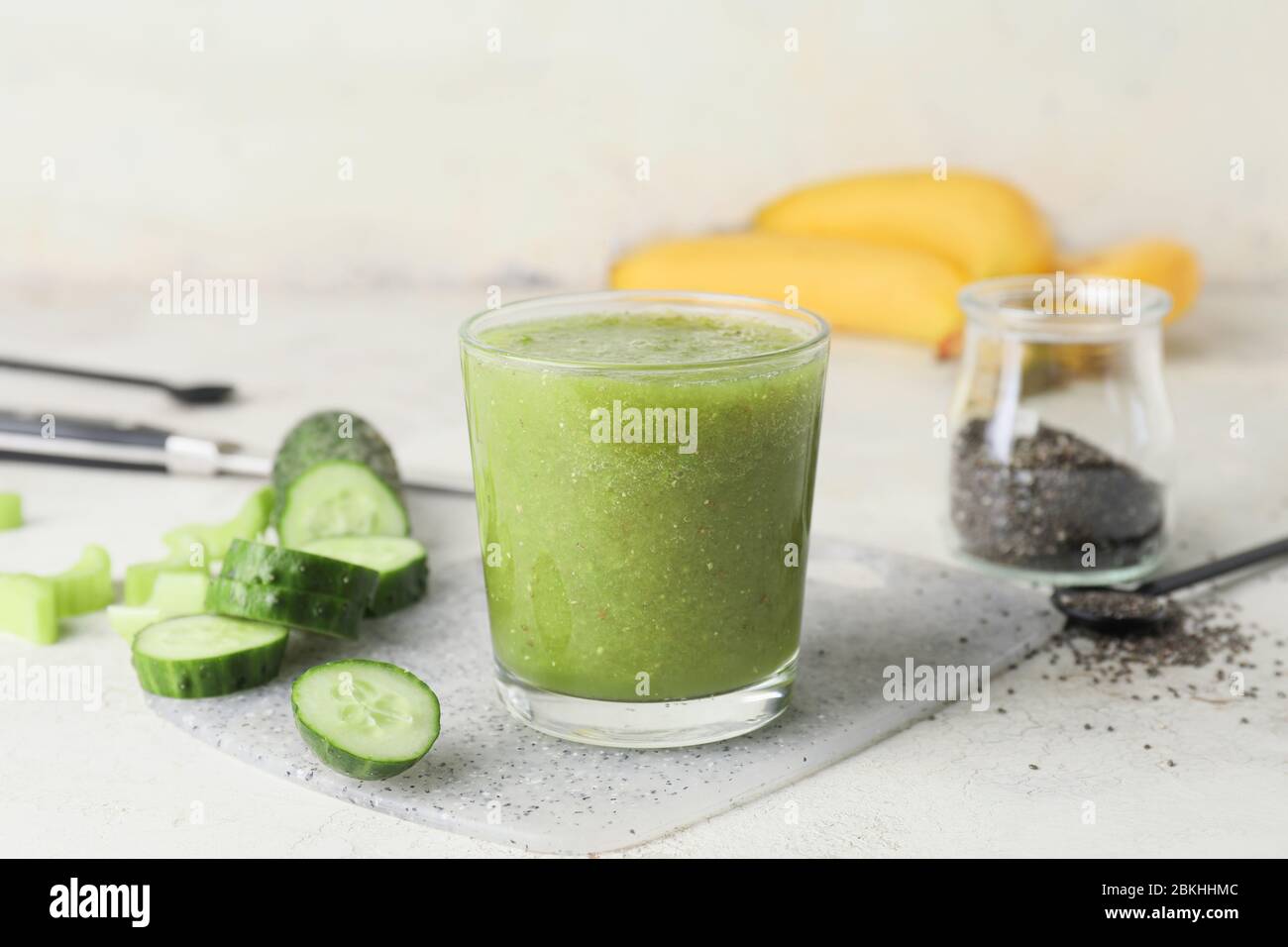 Glass of healthy smoothie on table Stock Photo - Alamy
