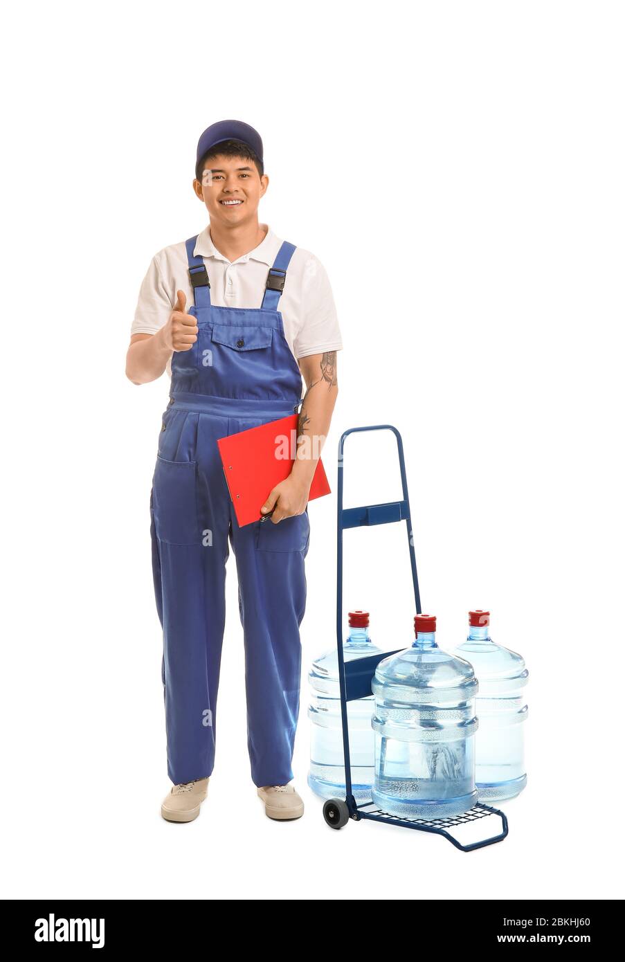 Delivery man with bottles of water on white background Stock Photo - Alamy