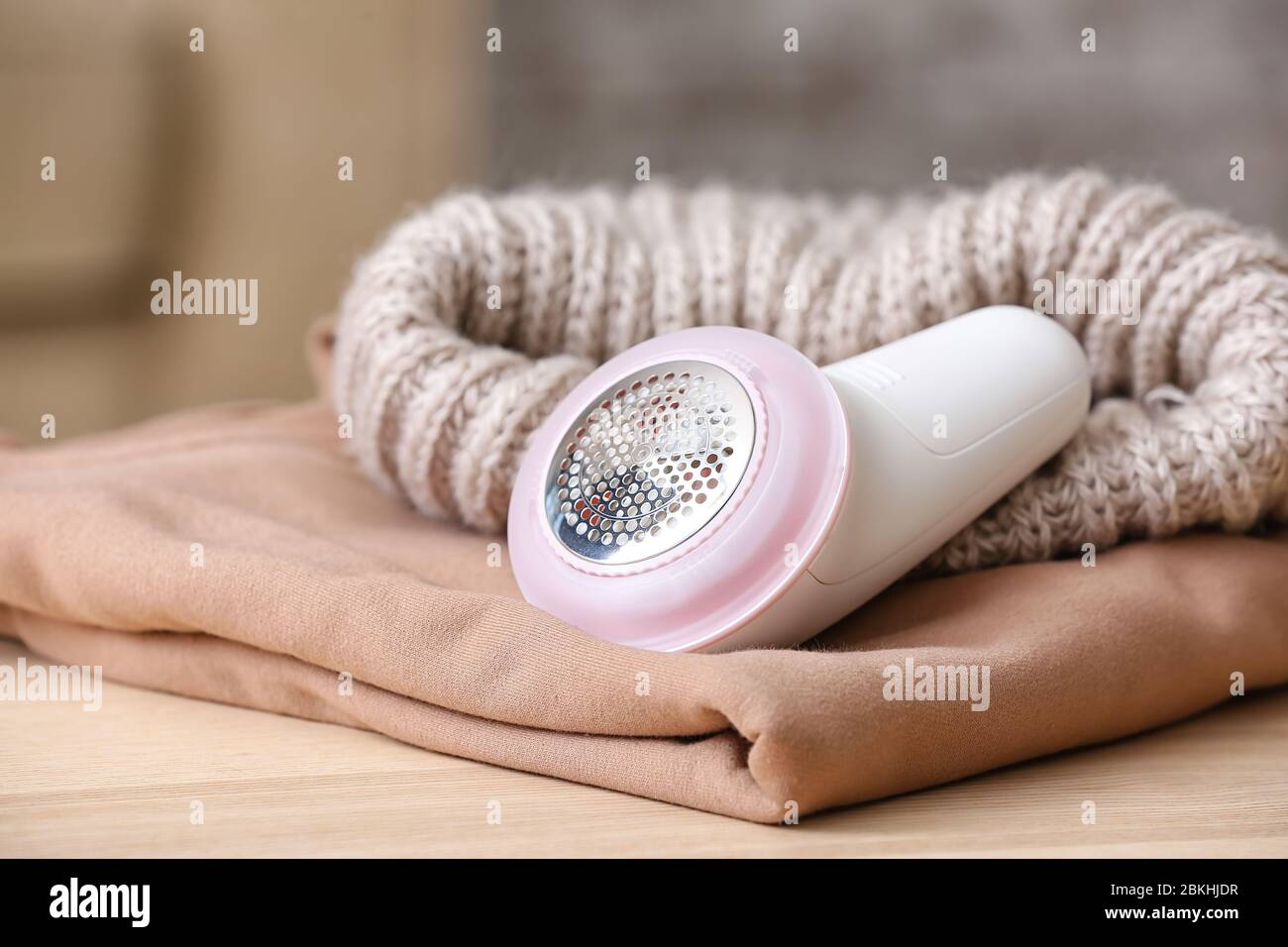 Modern electric fabric shaver hi-res stock photography and images - Alamy