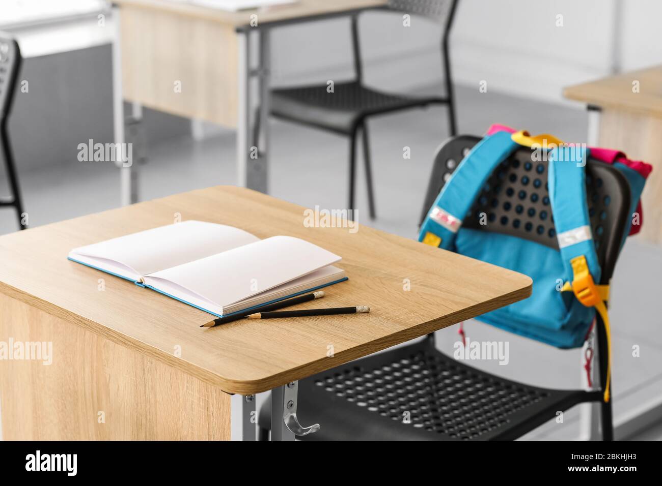 Modern desk in school classroom Stock Photo - Alamy