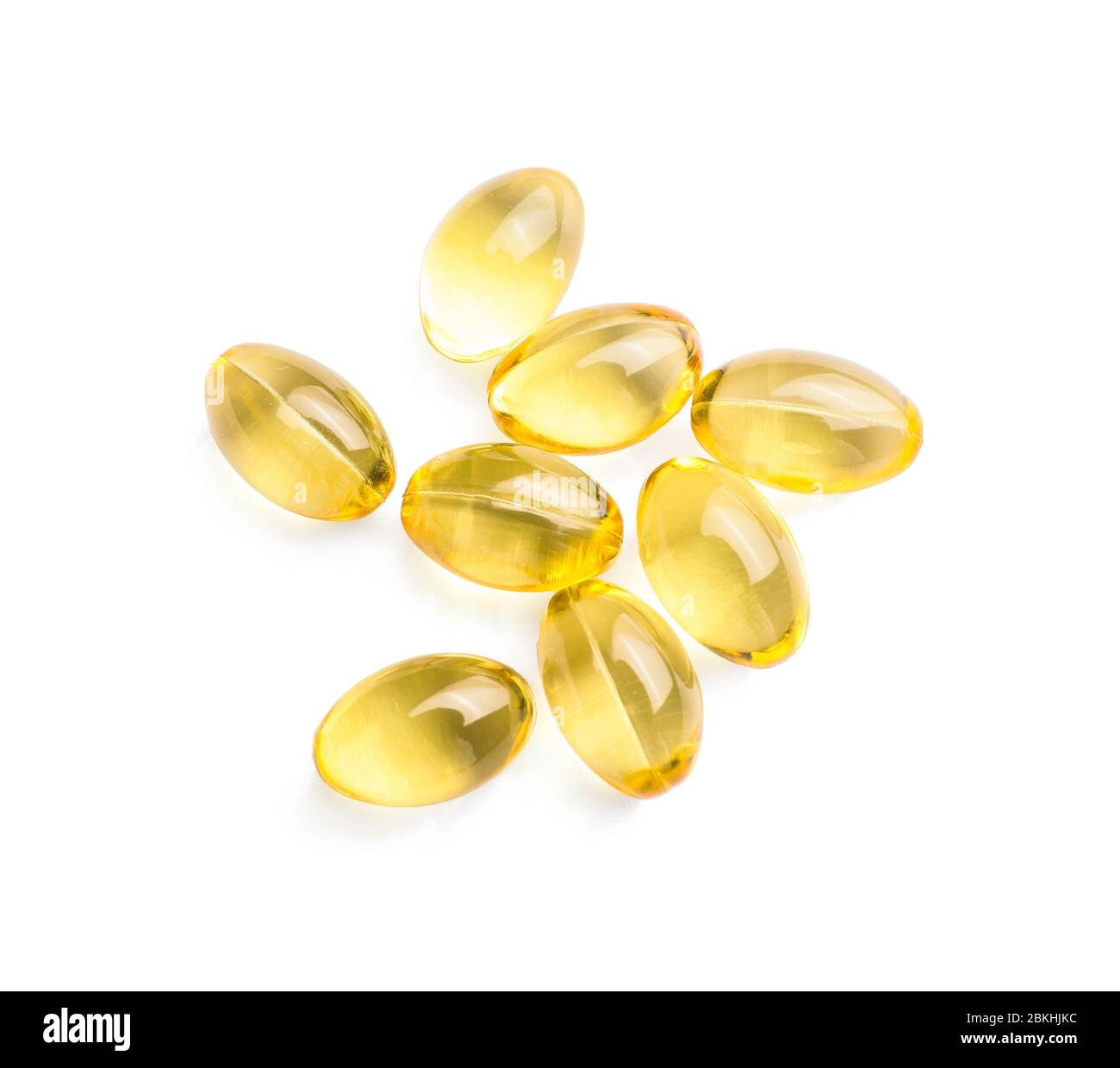 Fish oil capsules on white background Stock Photo - Alamy