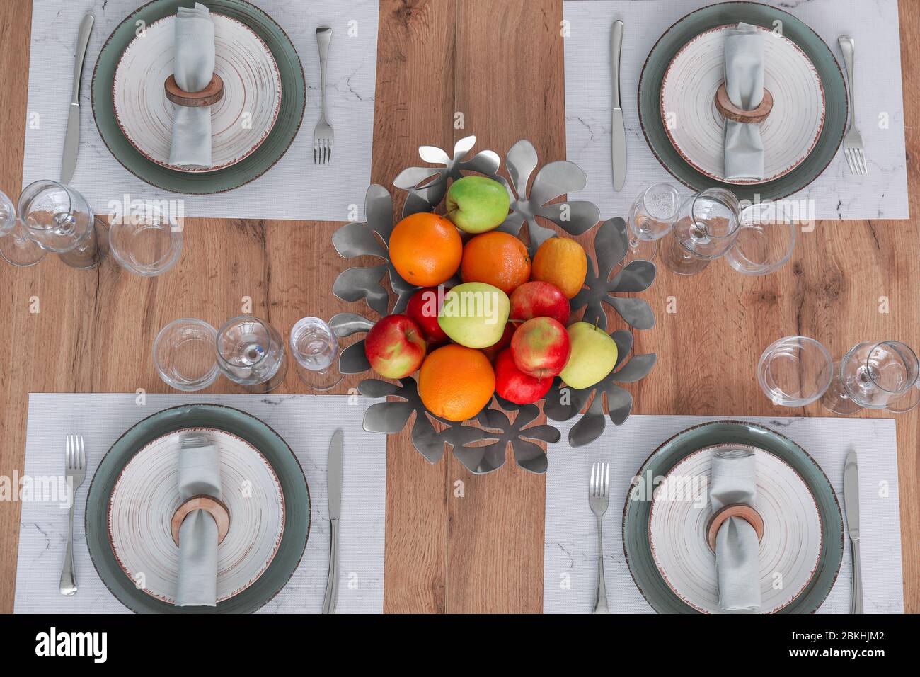 Table set in modern dining room, top view Stock Photo - Alamy