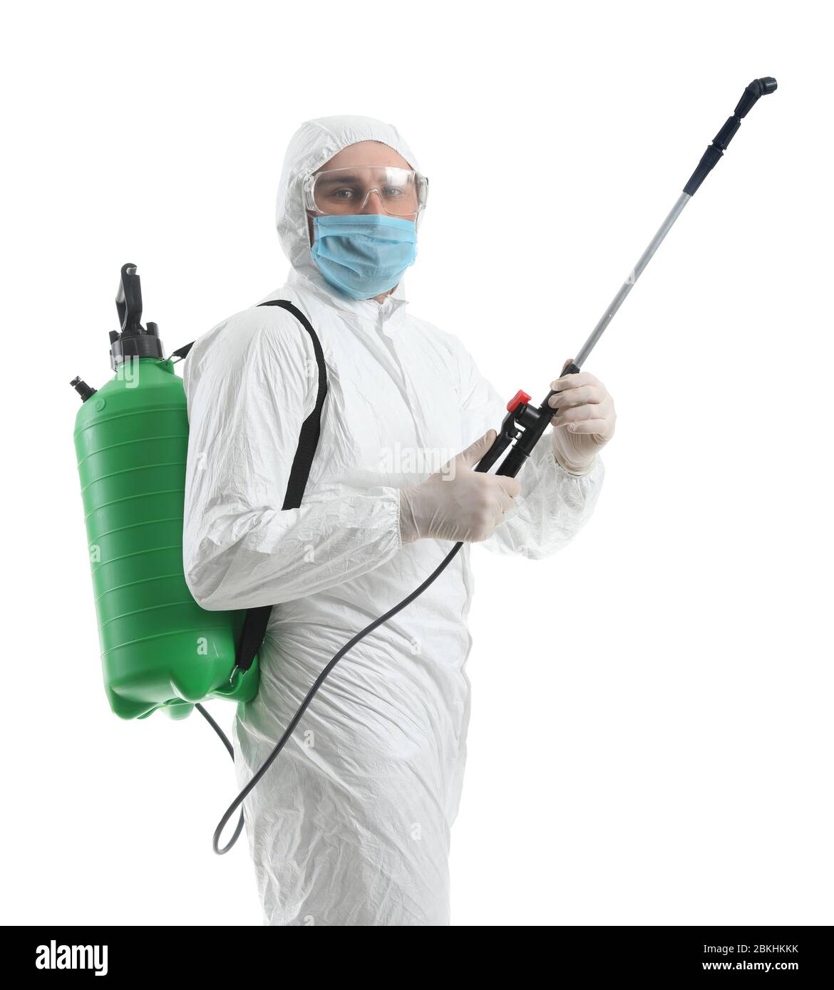 Worker in biohazard suit and with disinfectant on white background ...