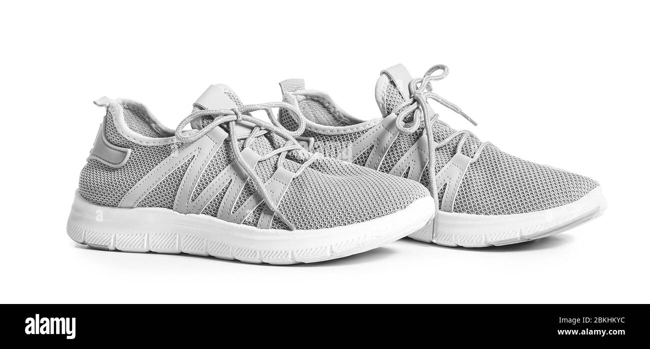 Sport shoes on white background Stock Photo - Alamy