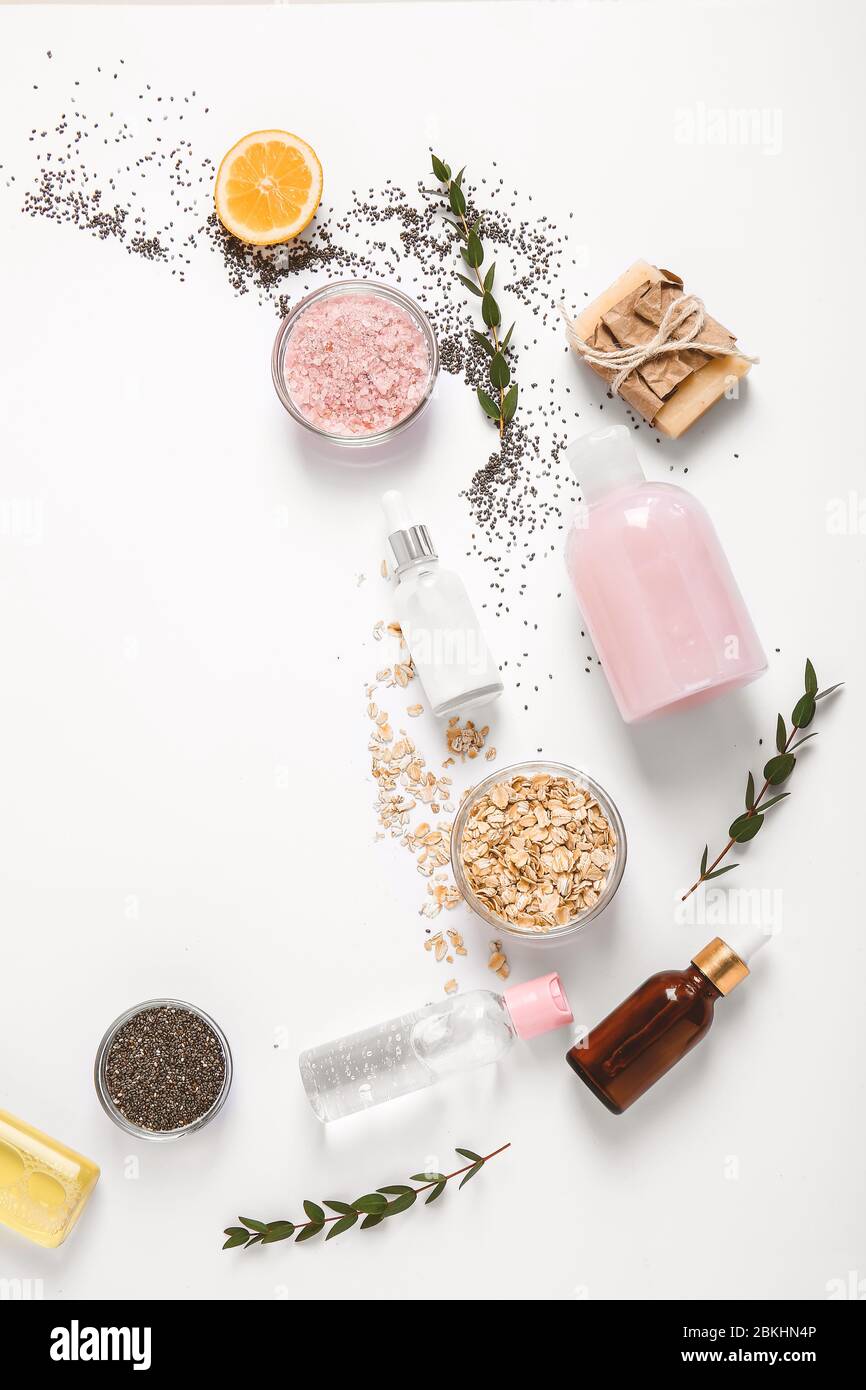 Natural cosmetics with ingredients on white background Stock Photo - Alamy