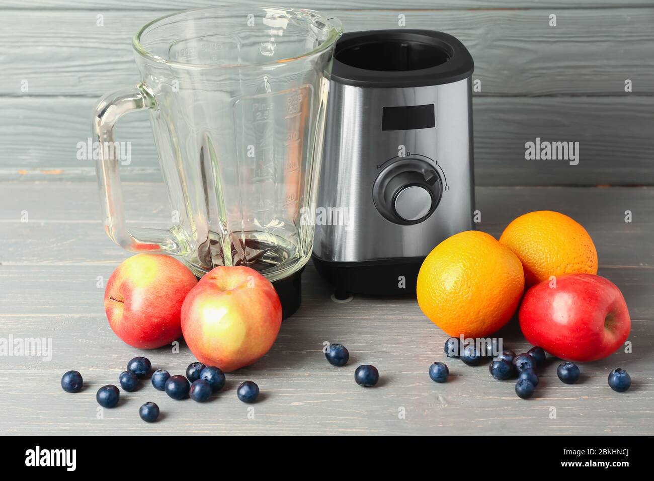 Modern blender and products on wooden background Stock Photo - Alamy