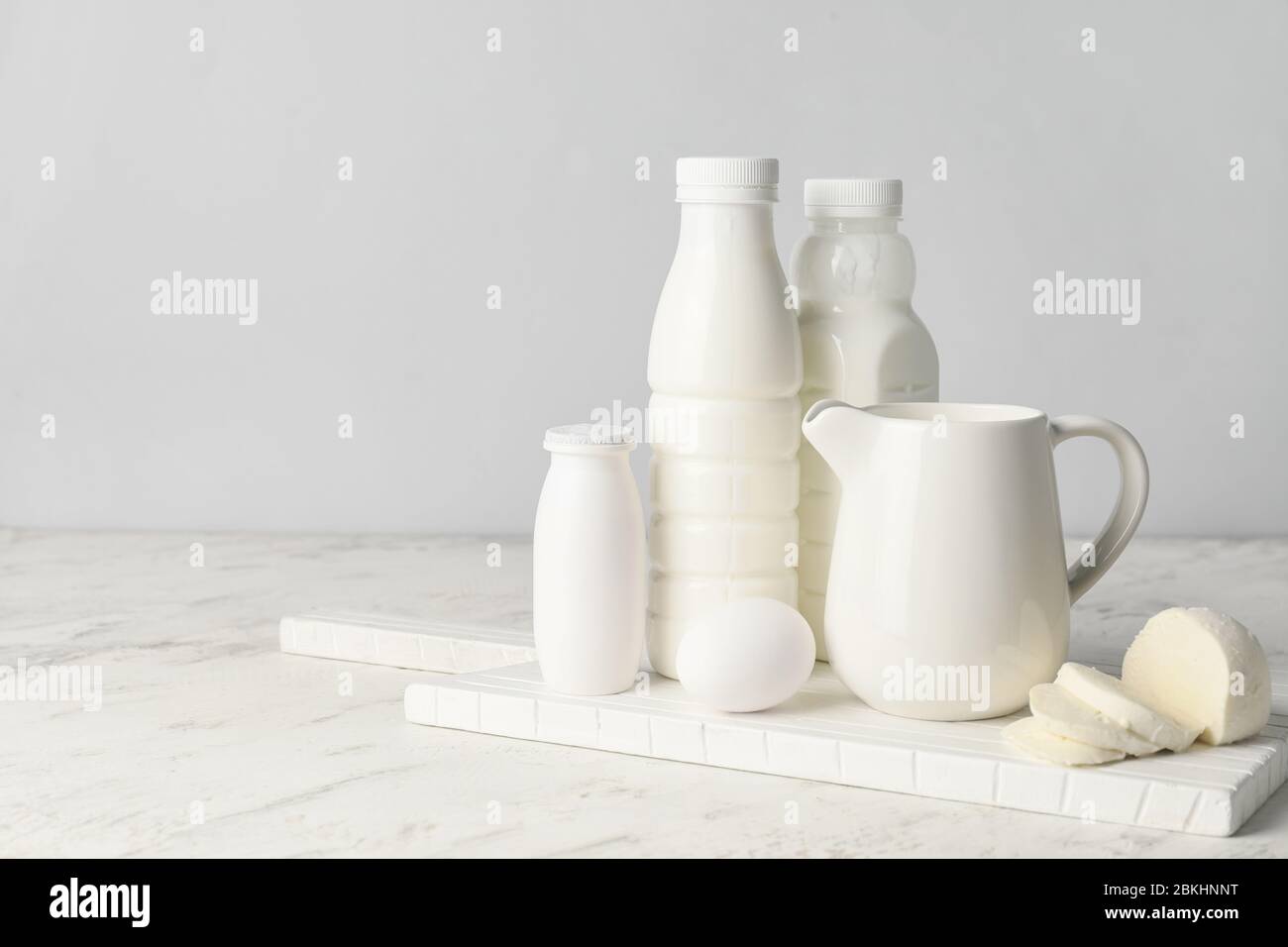Different dairy products without lactose on light background Stock ...