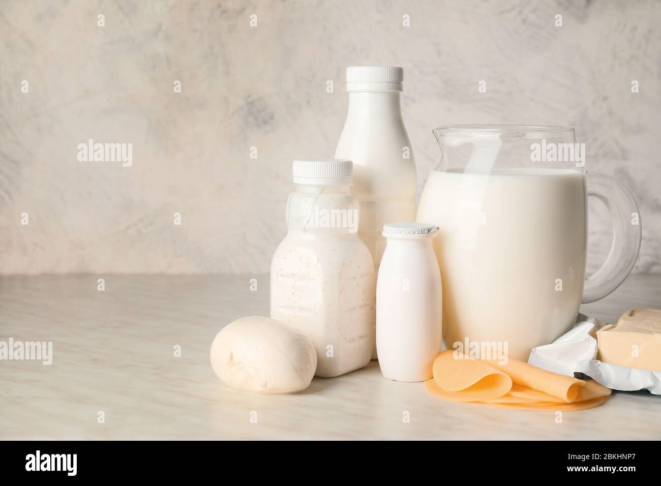 Different dairy products without lactose on light background Stock ...