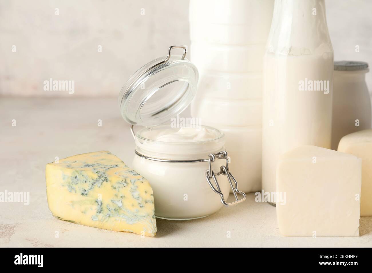 Different dairy products without lactose on light background Stock ...