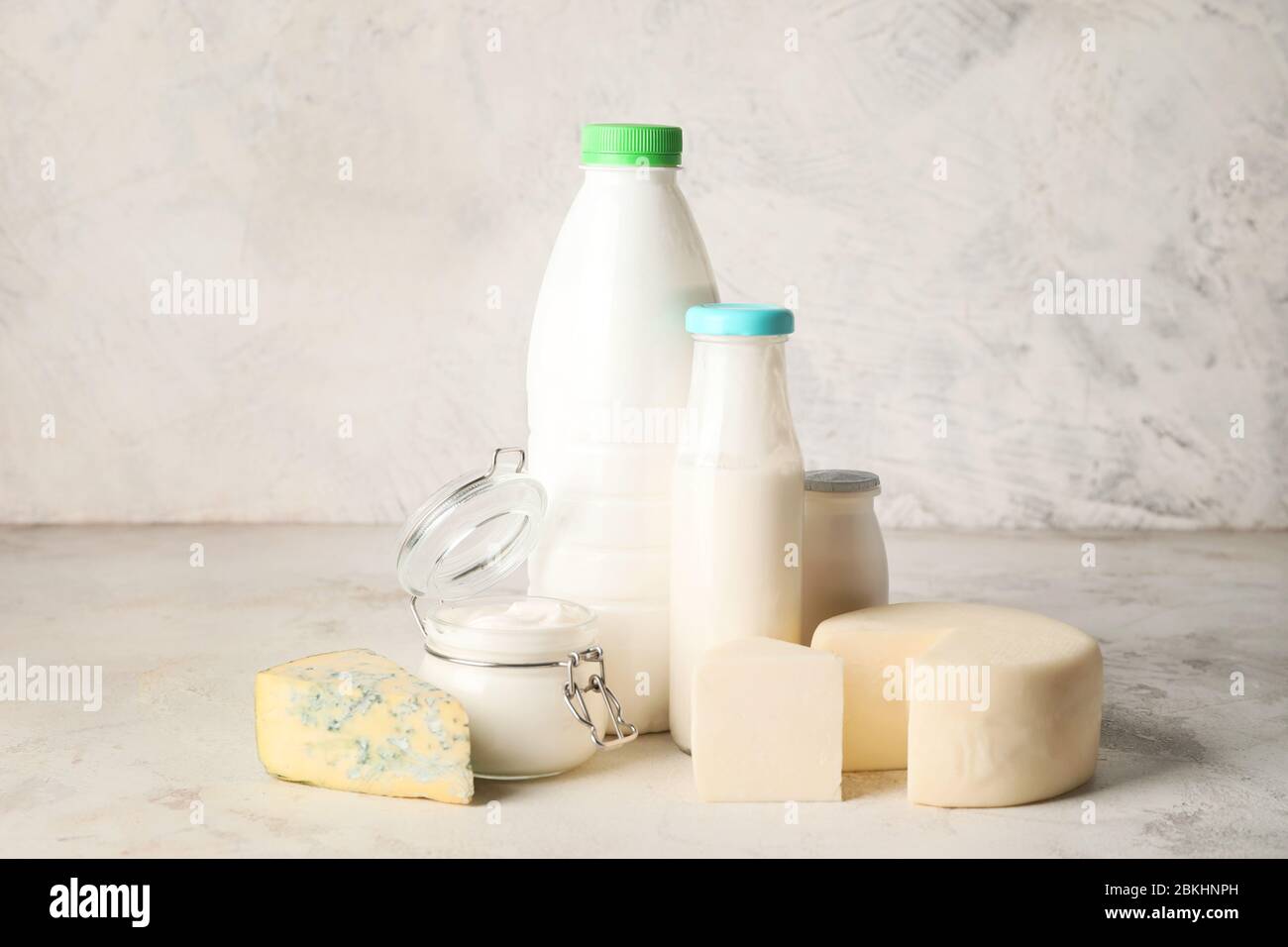 Different dairy products without lactose on light background Stock ...