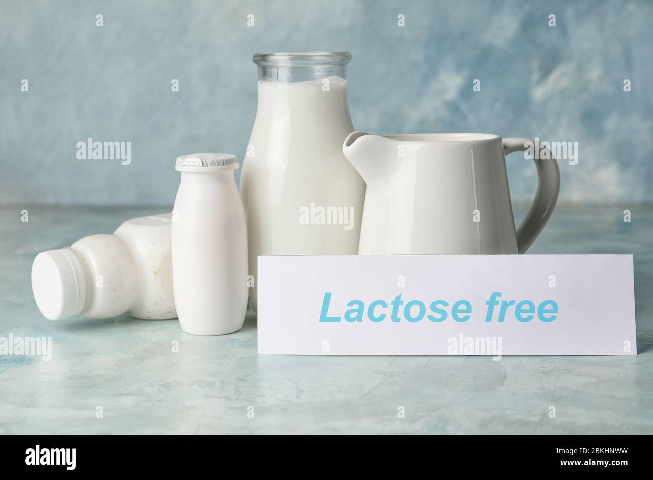 Different dairy products without lactose on color background Stock ...
