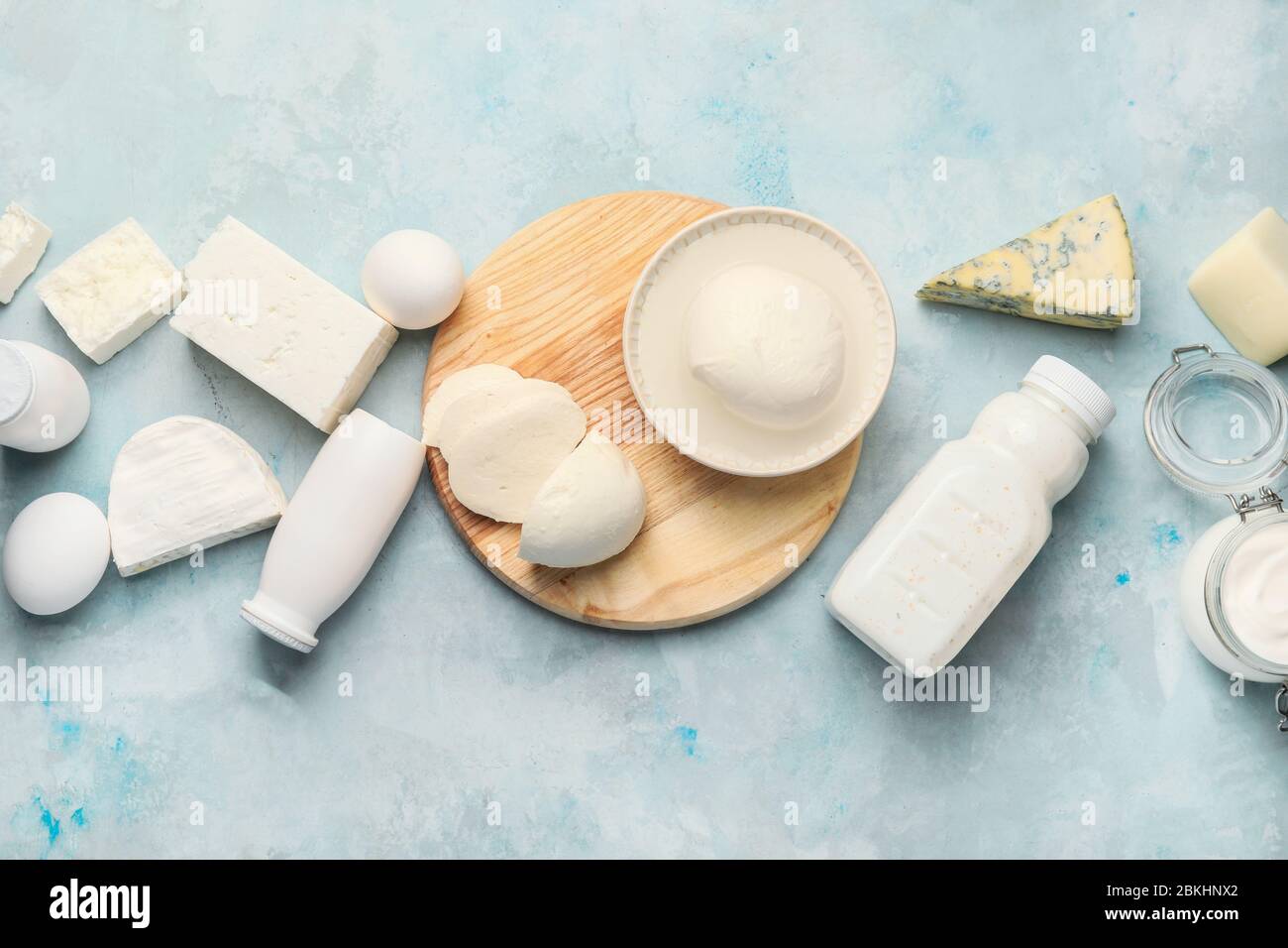 Different dairy products without lactose on color background Stock ...