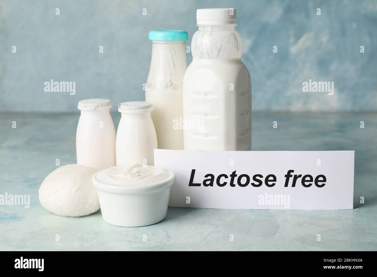 Different dairy products without lactose on color background Stock ...