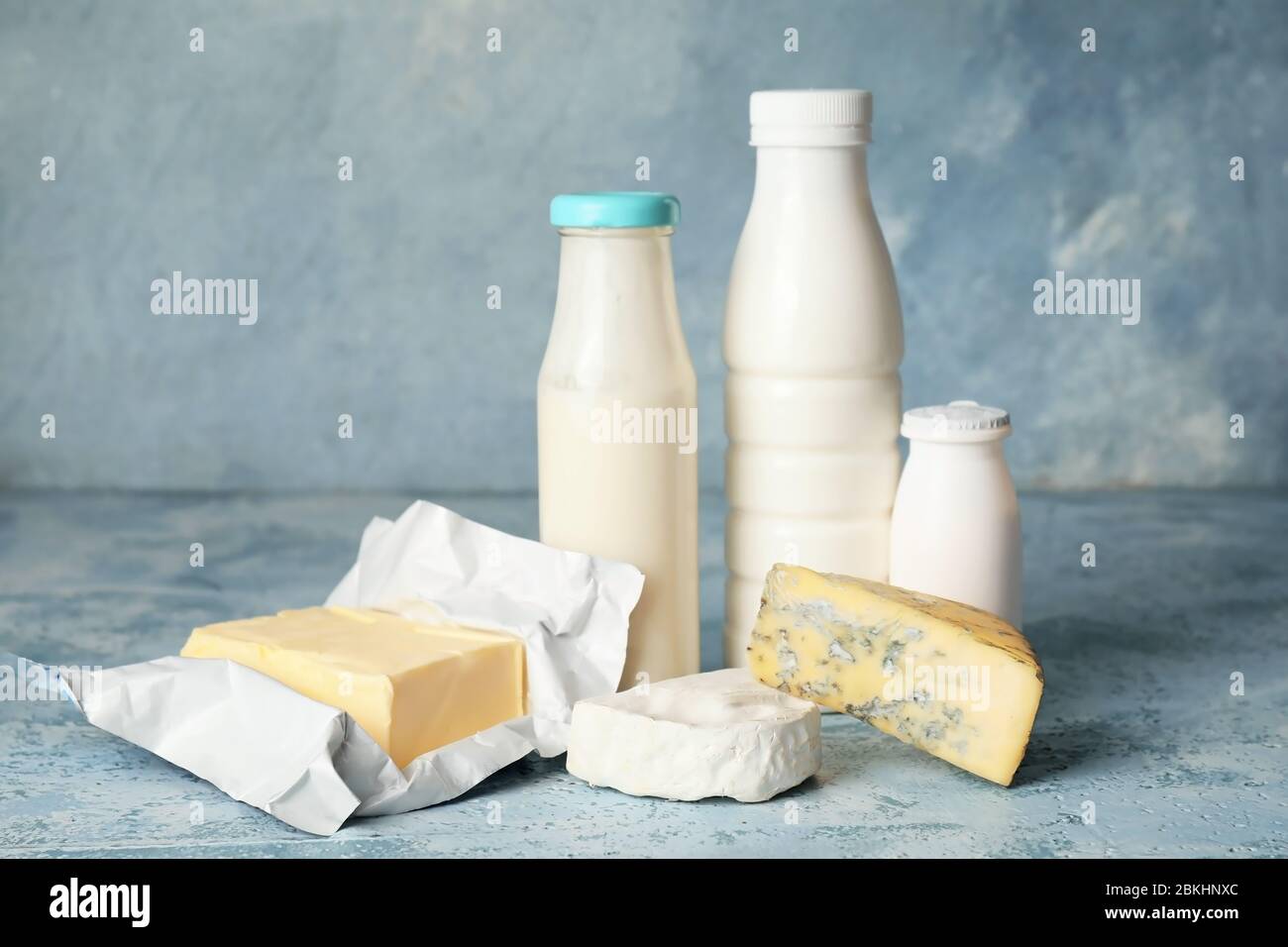 Different dairy products without lactose on color background Stock ...