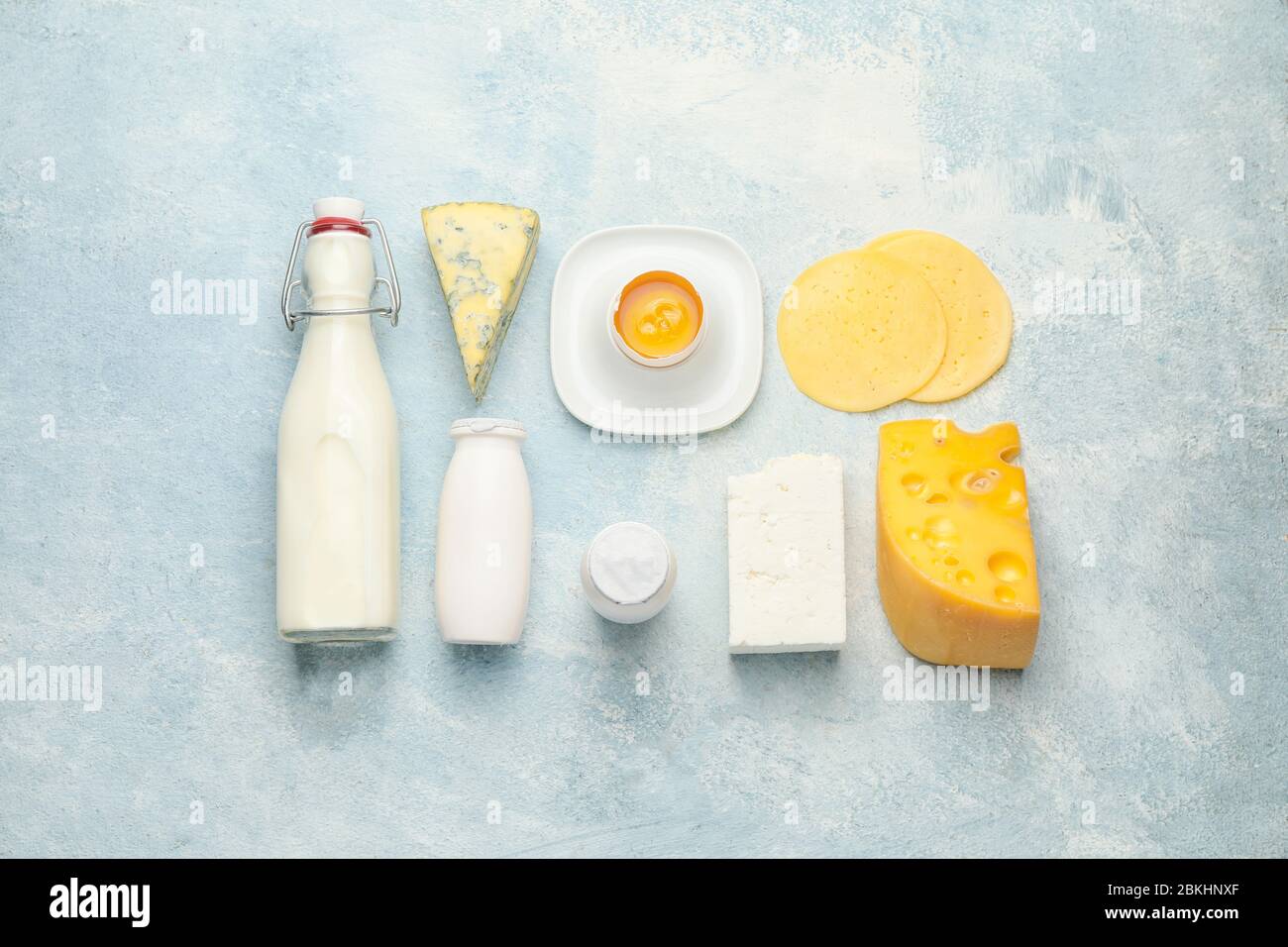Different dairy products without lactose on color background Stock ...