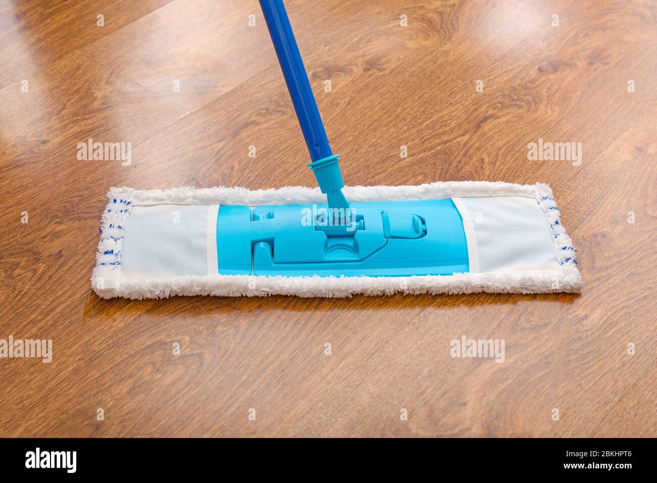 Cleaning of floor with mop Stock Photo - Alamy