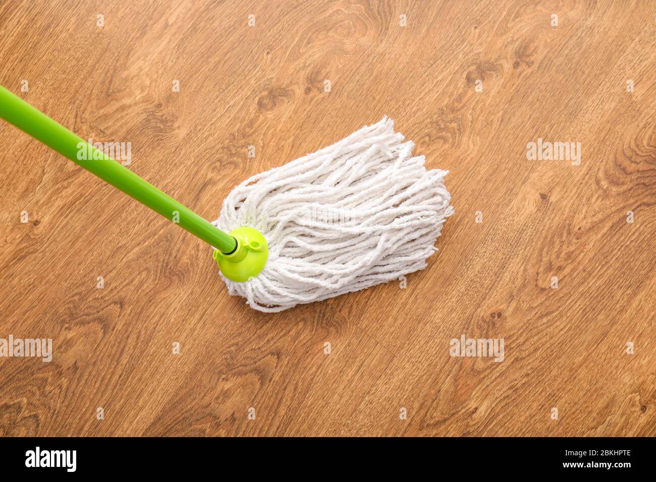 Cleaning of floor with mop Stock Photo - Alamy