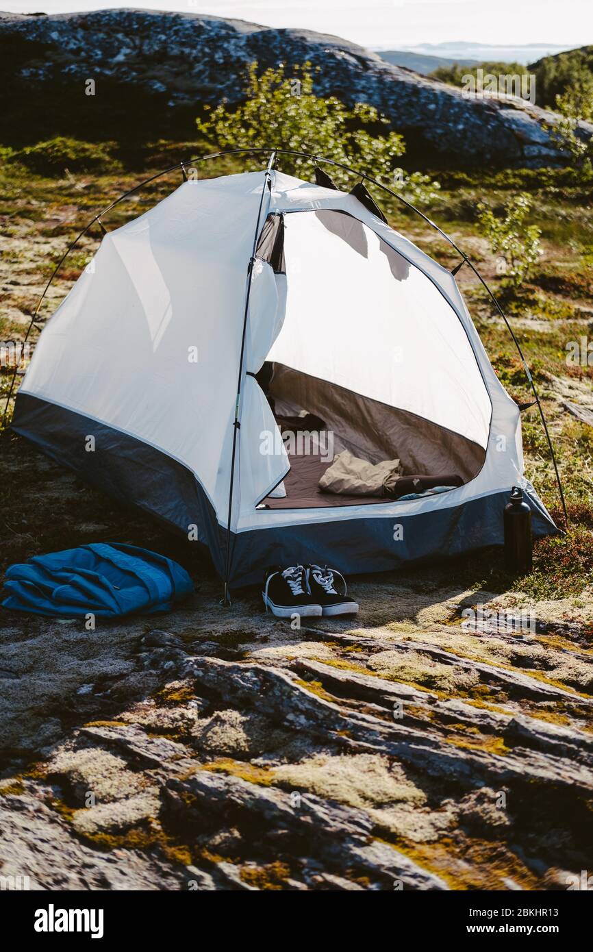 Camping tent set on a rocky terrain Stock Photo - Alamy