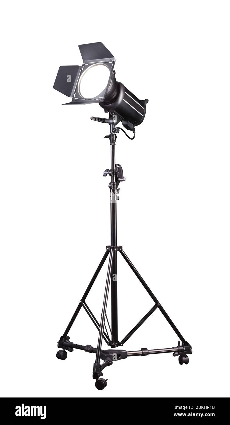 Photography studio flash on a lighting stand isolated on white ...