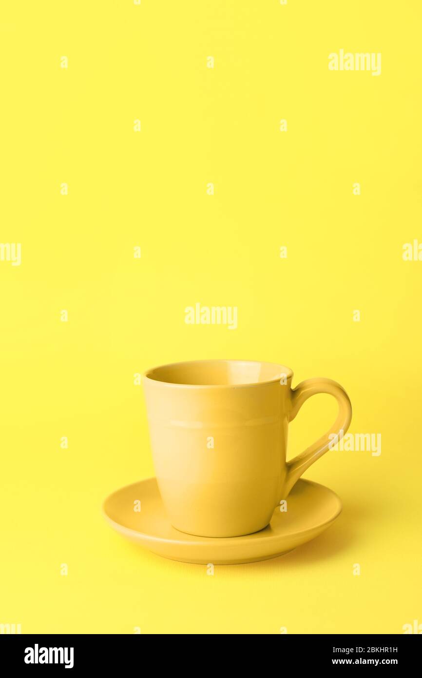 Blank cup on color background Stock Photo - Alamy