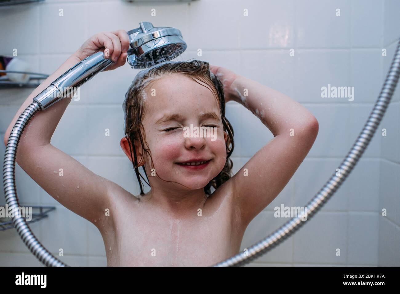Child shower washing hi-res stock photography and images - Alamy