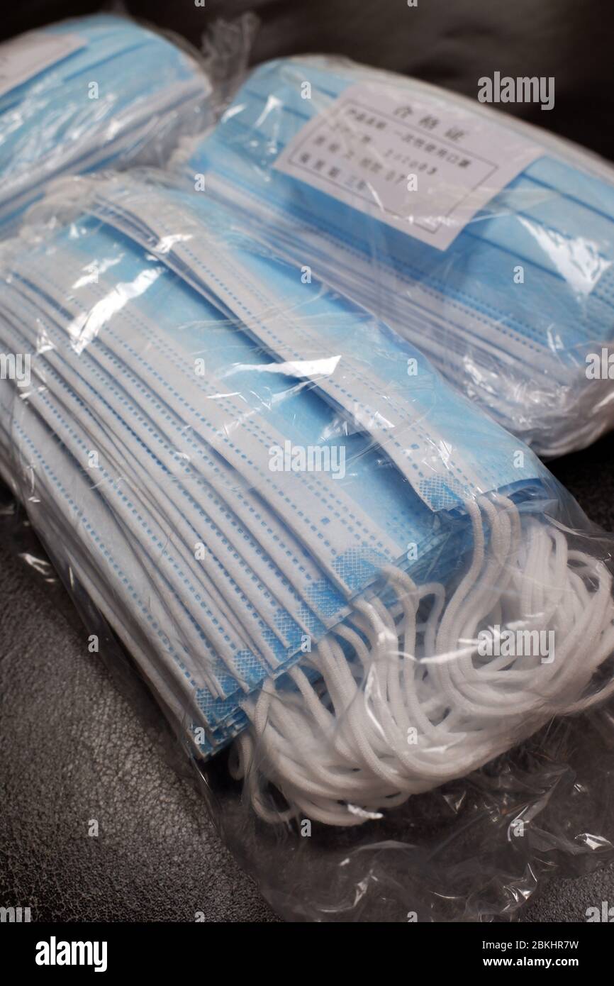 Bundles of Chinese made surgical masks with passed QC label in Chinese ...