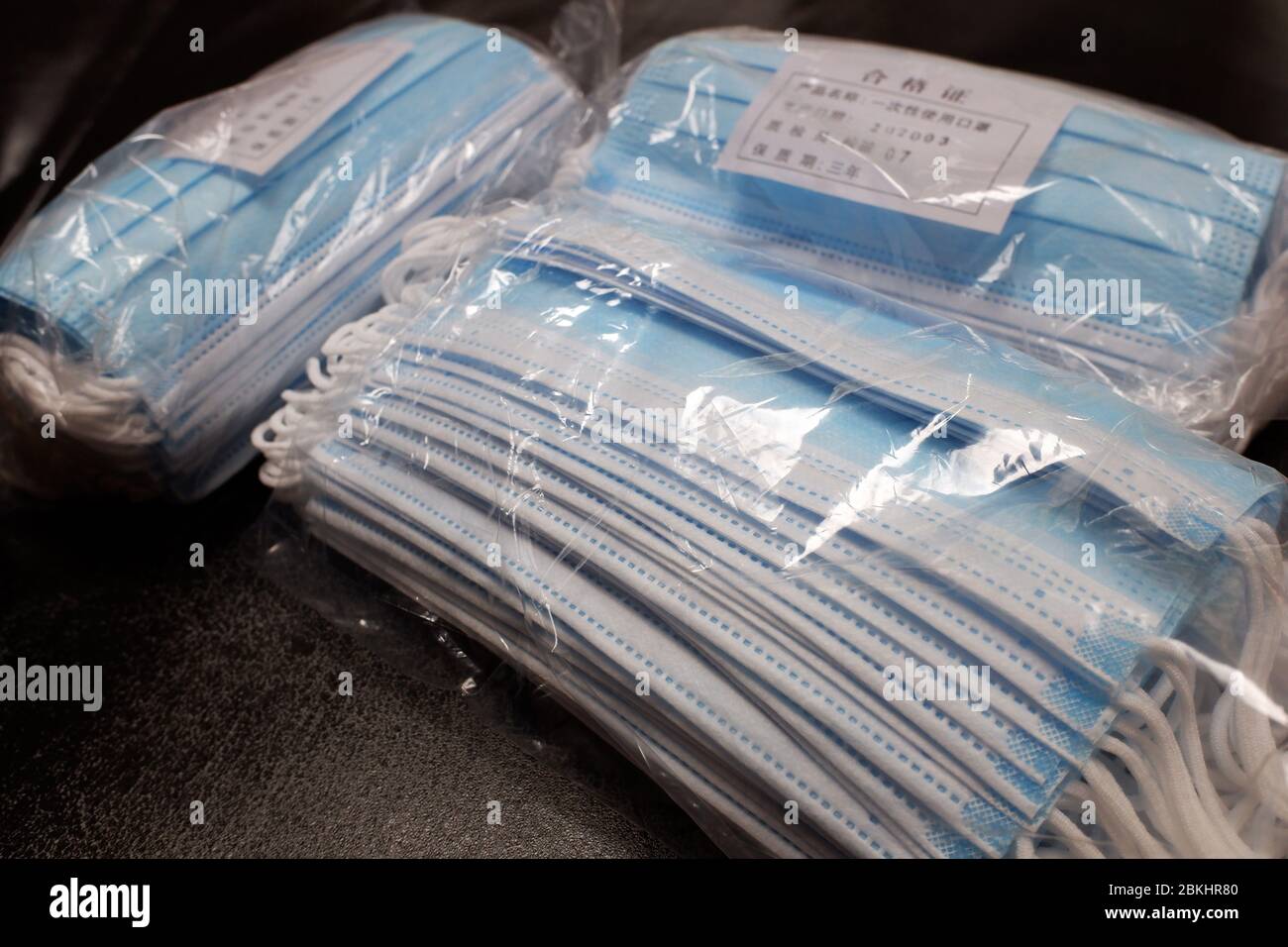 Bundles of Chinese made surgical masks with passed QC label in Chinese ...