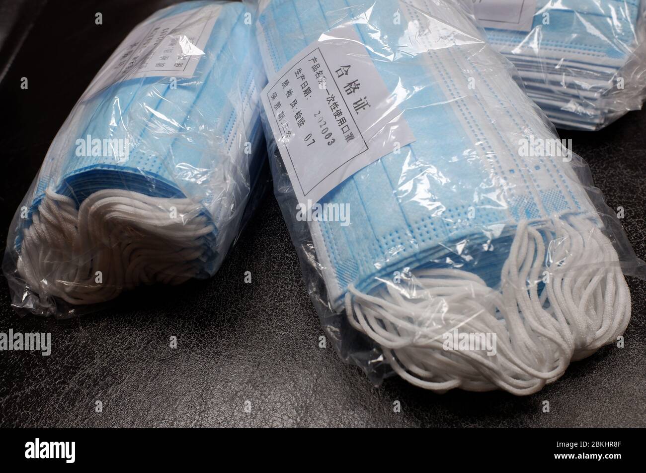 Bundles of Chinese made surgical masks with passed QC label in Chinese ...