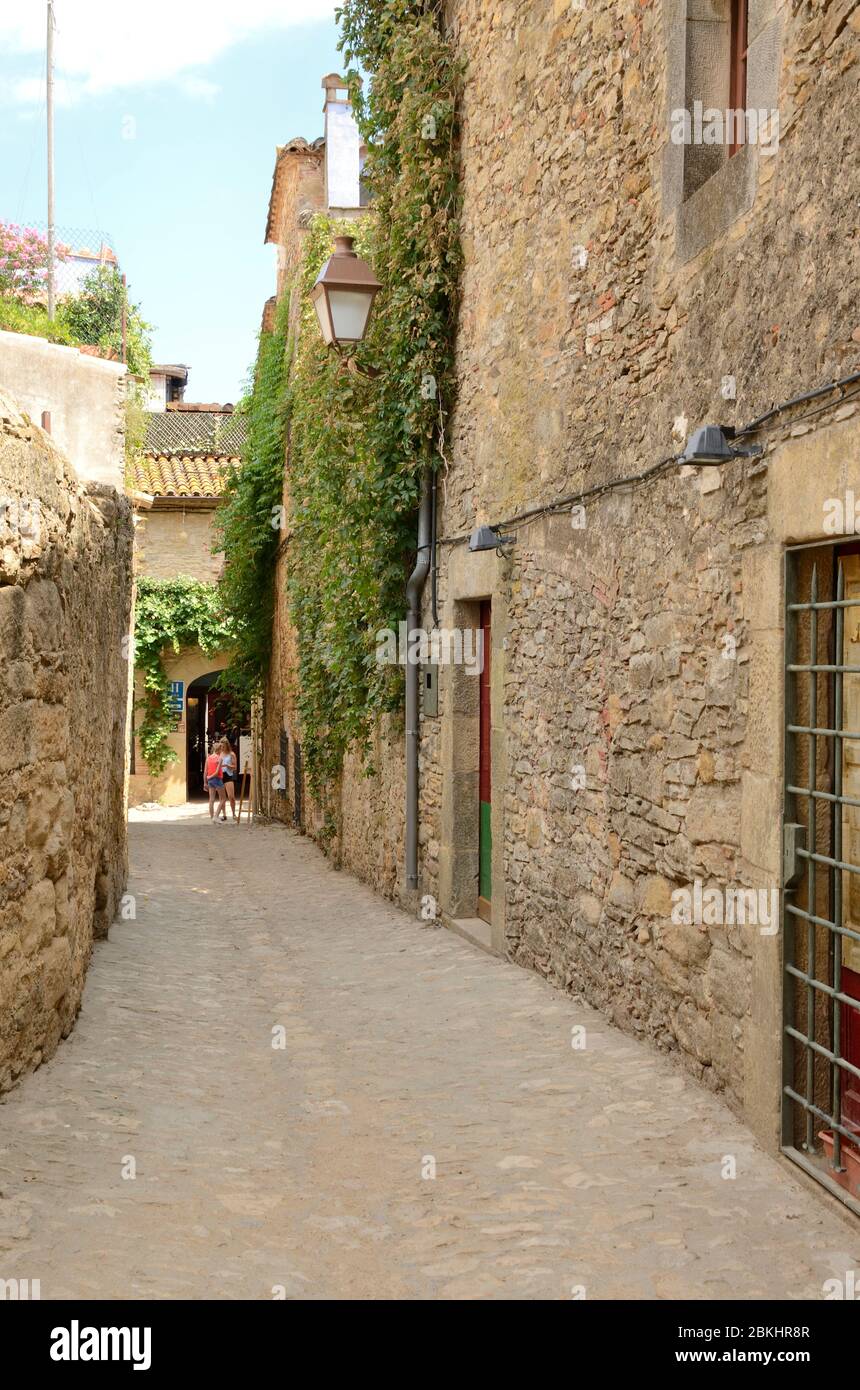 Peratallada, Spain - July 25, 2017: Girls at narrow stone alley of the ...