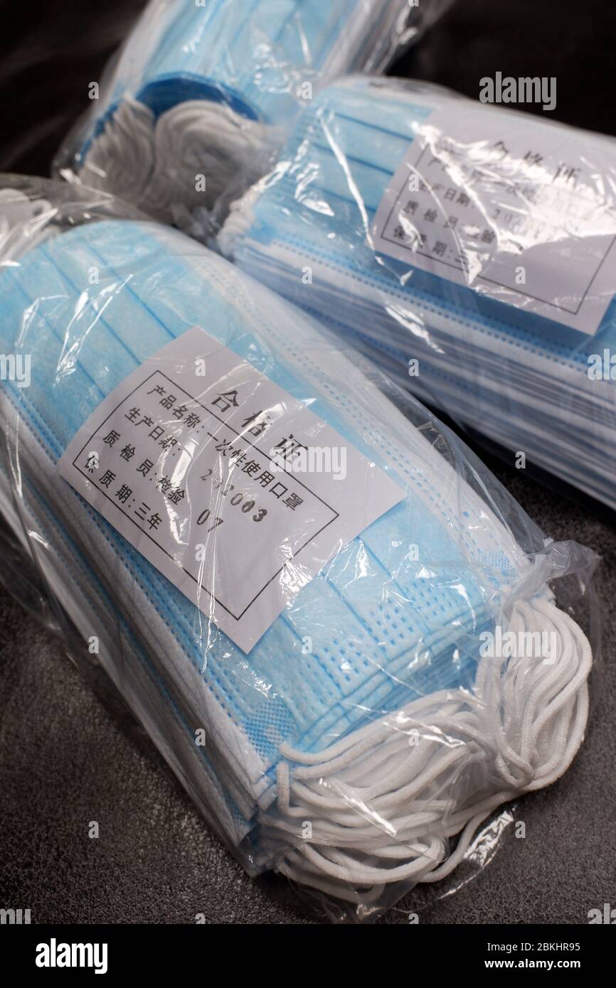 Bundles of Chinese made surgical masks with passed QC label in Chinese ...