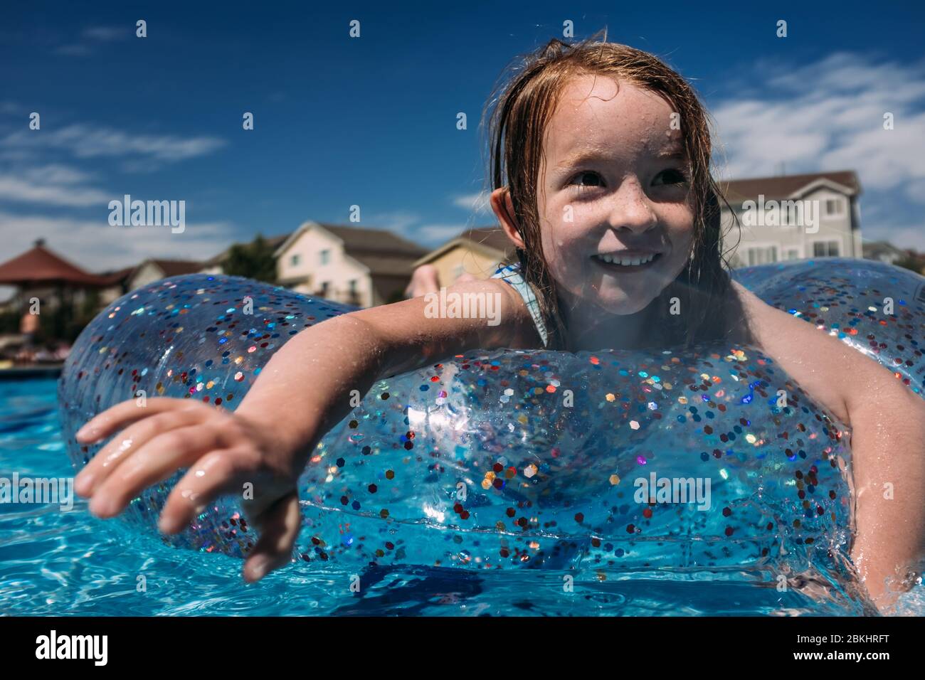 Kids on float hi-res stock photography and images - Alamy
