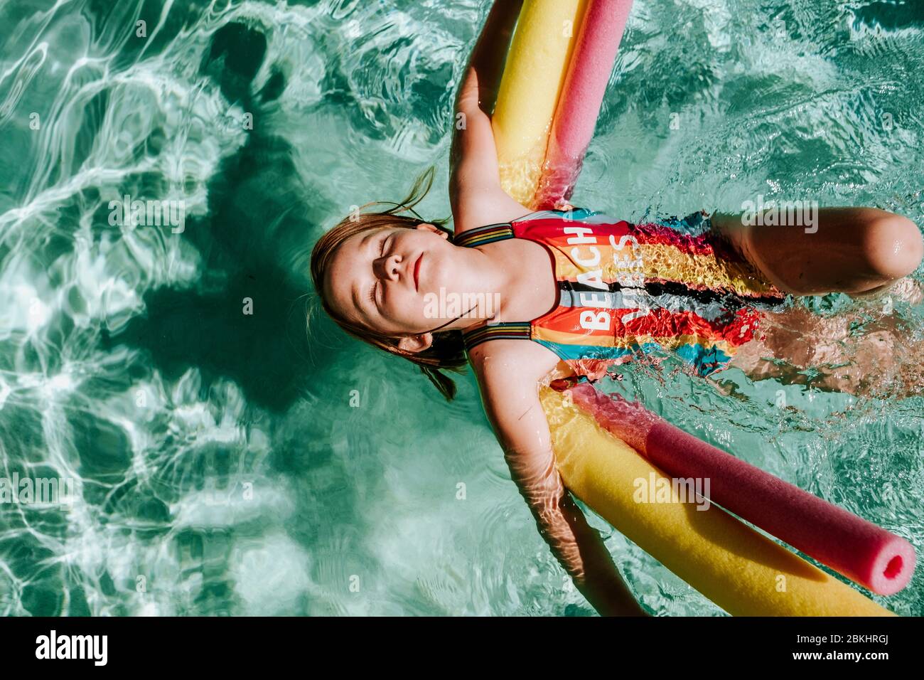 Child floating on back hi-res stock photography and images - Alamy