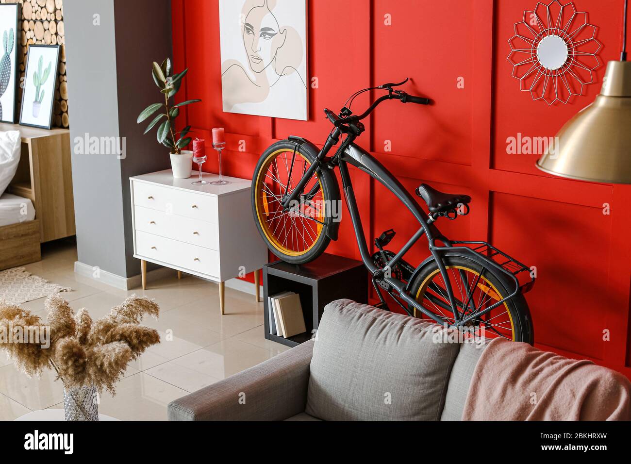 Interior of modern room with bicycle Stock Photo - Alamy