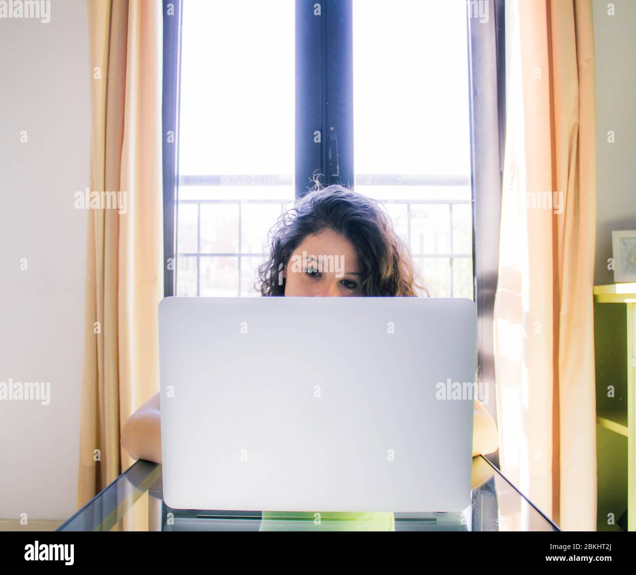 young girl working at home with computer Stock Photo - Alamy