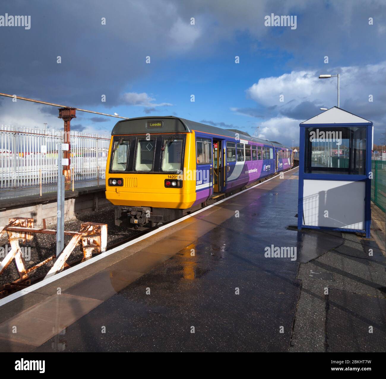 Northern Rail class 142 pacer train at the semi derelict Heysham Port railway station with the ...