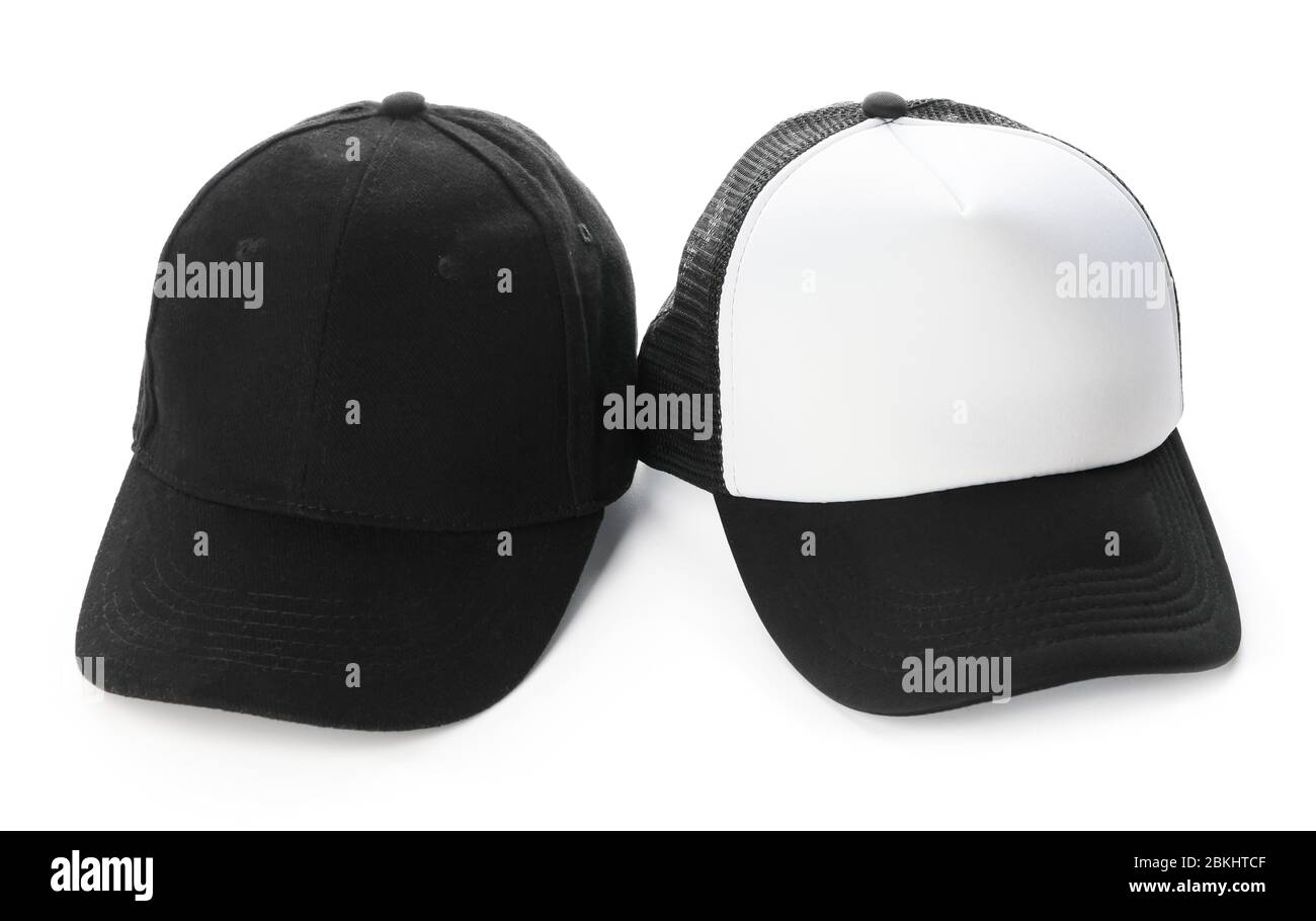 Blank caps on white background Stock Photo - Alamy