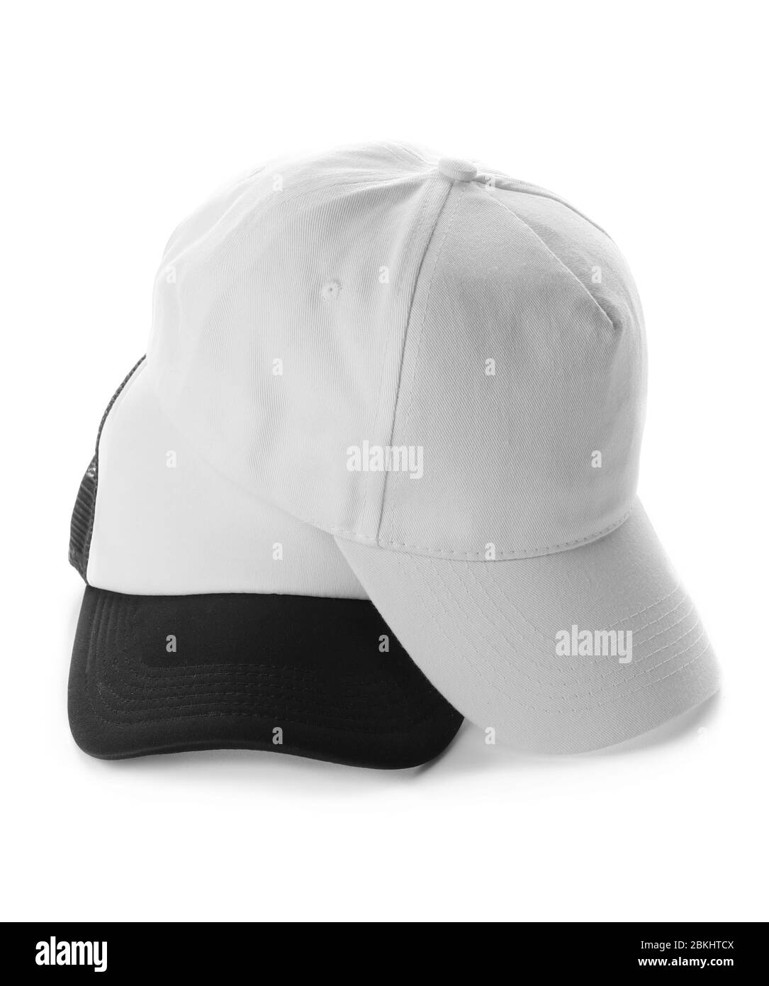 Blank caps on white background Stock Photo - Alamy